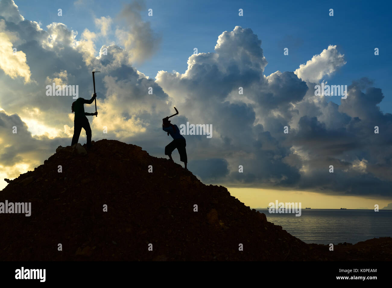 Farmer using hoe hand tool hi-res stock photography and images - Alamy