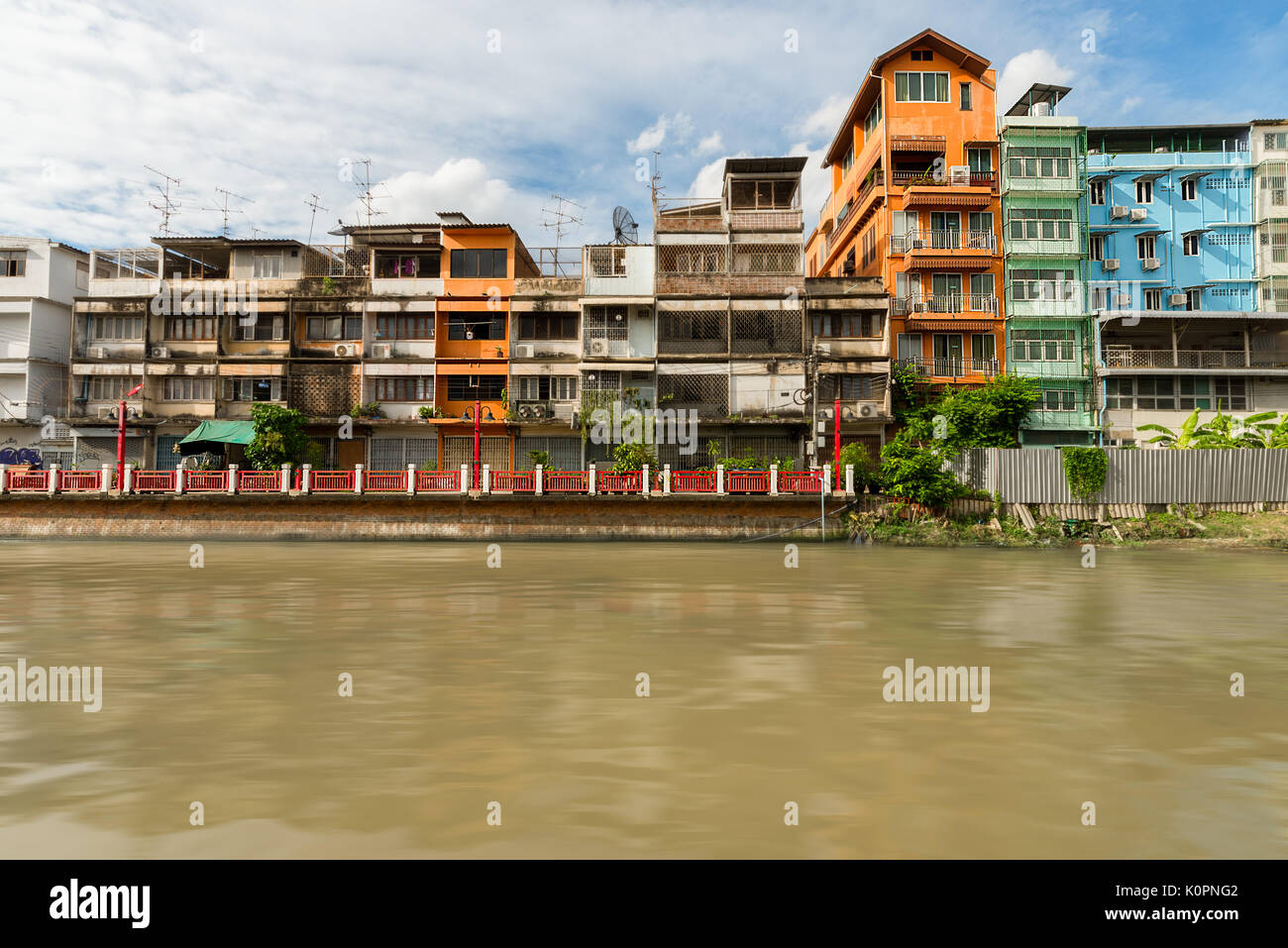 Narrow Terraced housing over looking a canal waterway in central ...