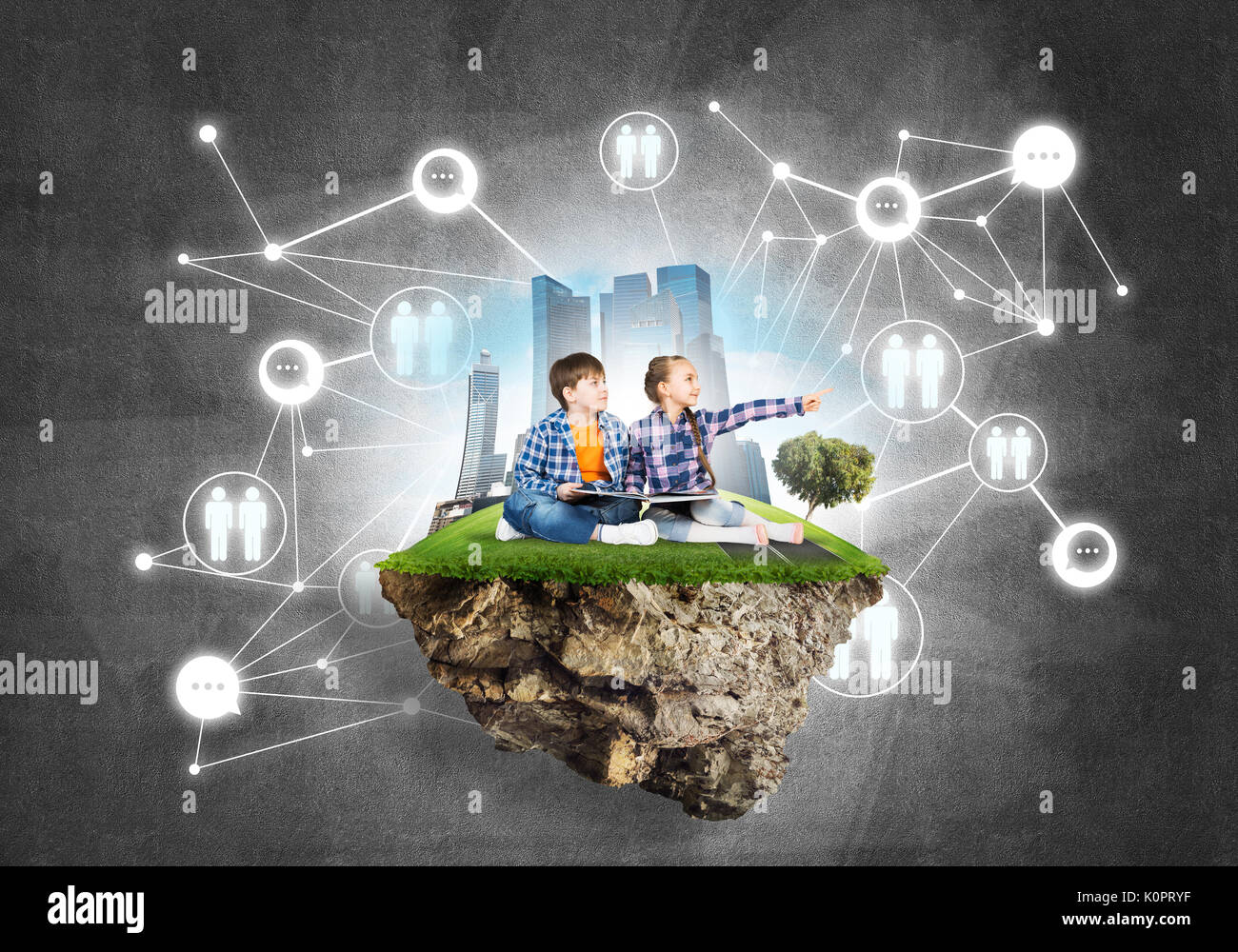 Two kids of school age with book exploring this great world Stock Photo ...