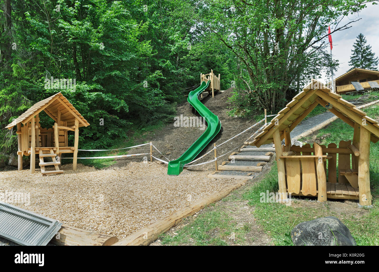 Playground with green slide Stock Photo - Alamy