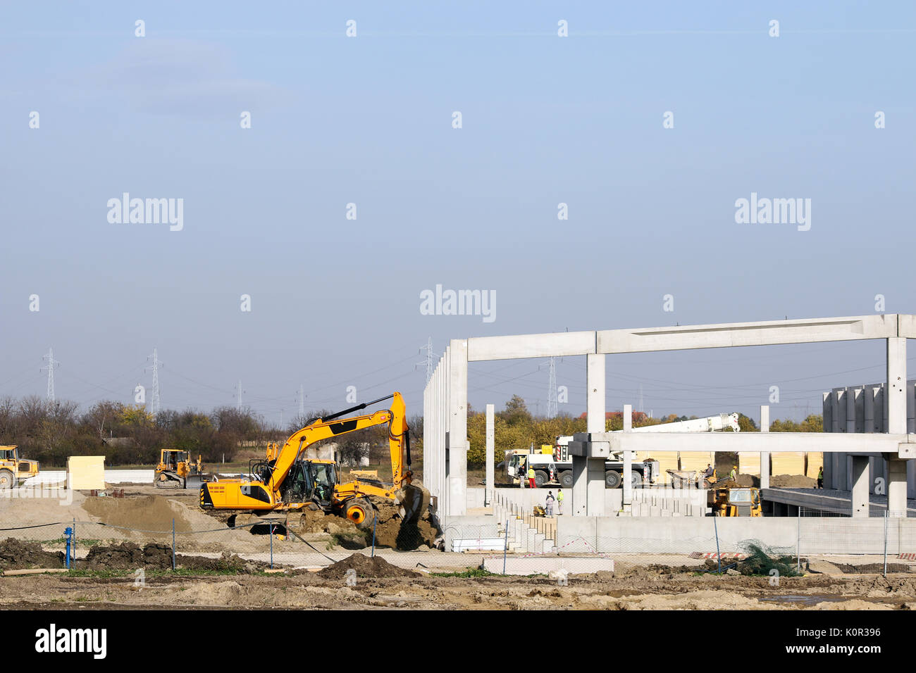 new factory construction site with workers Stock Photo - Alamy