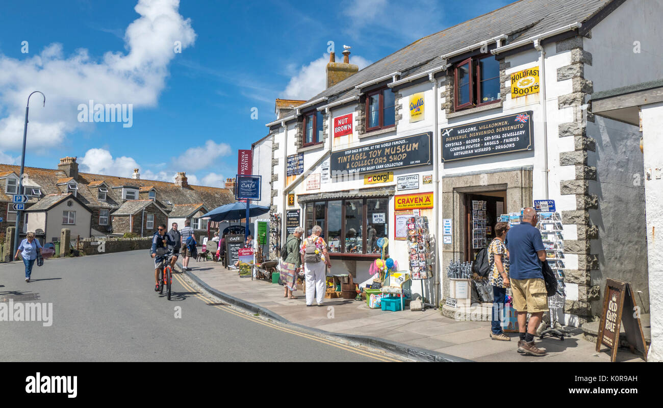 General view of people looking in shops along the start of Fore Street ...