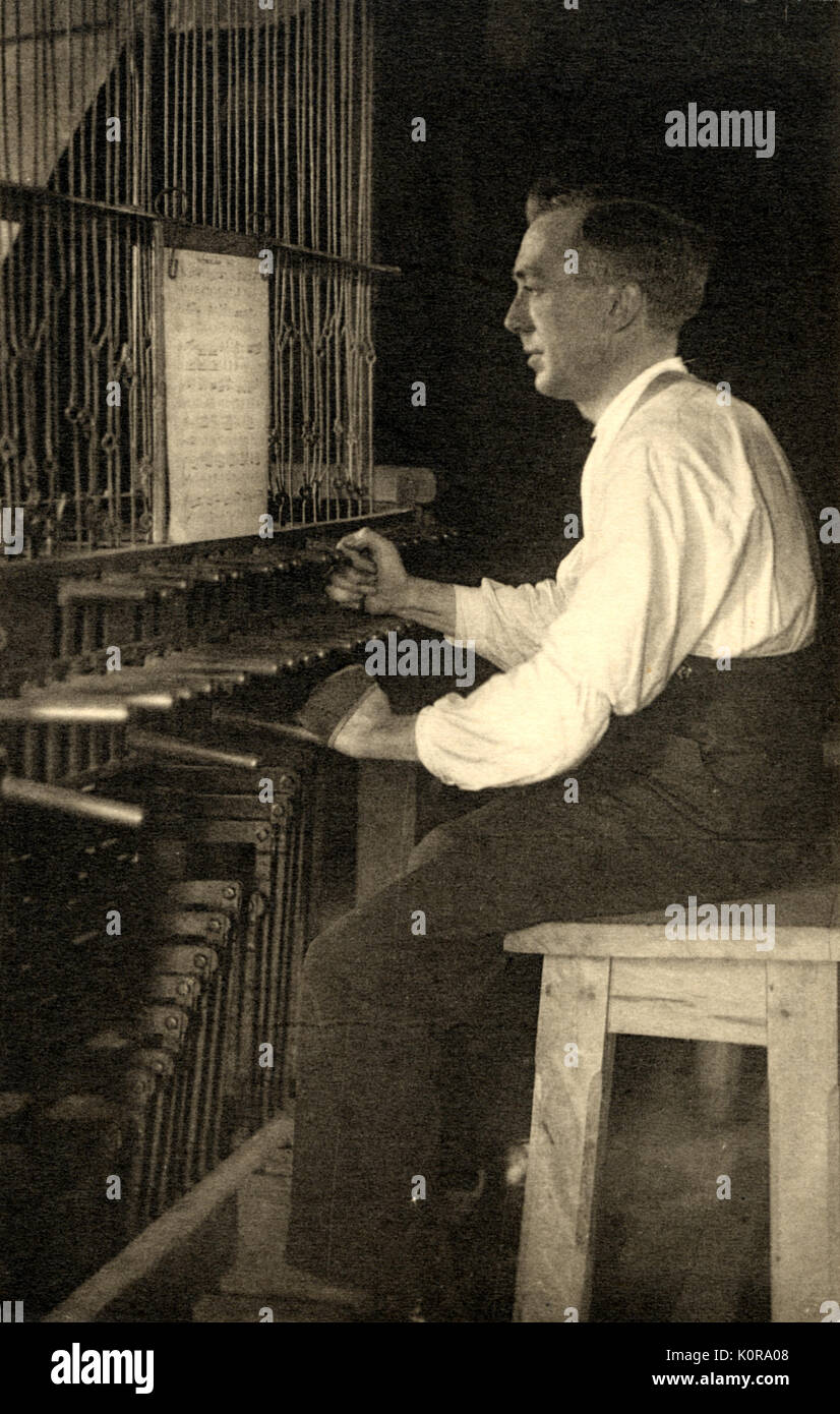 INSTRUMENTS-PERCUSSION-BELLS Bell master at Bruges playing his keyboard ...