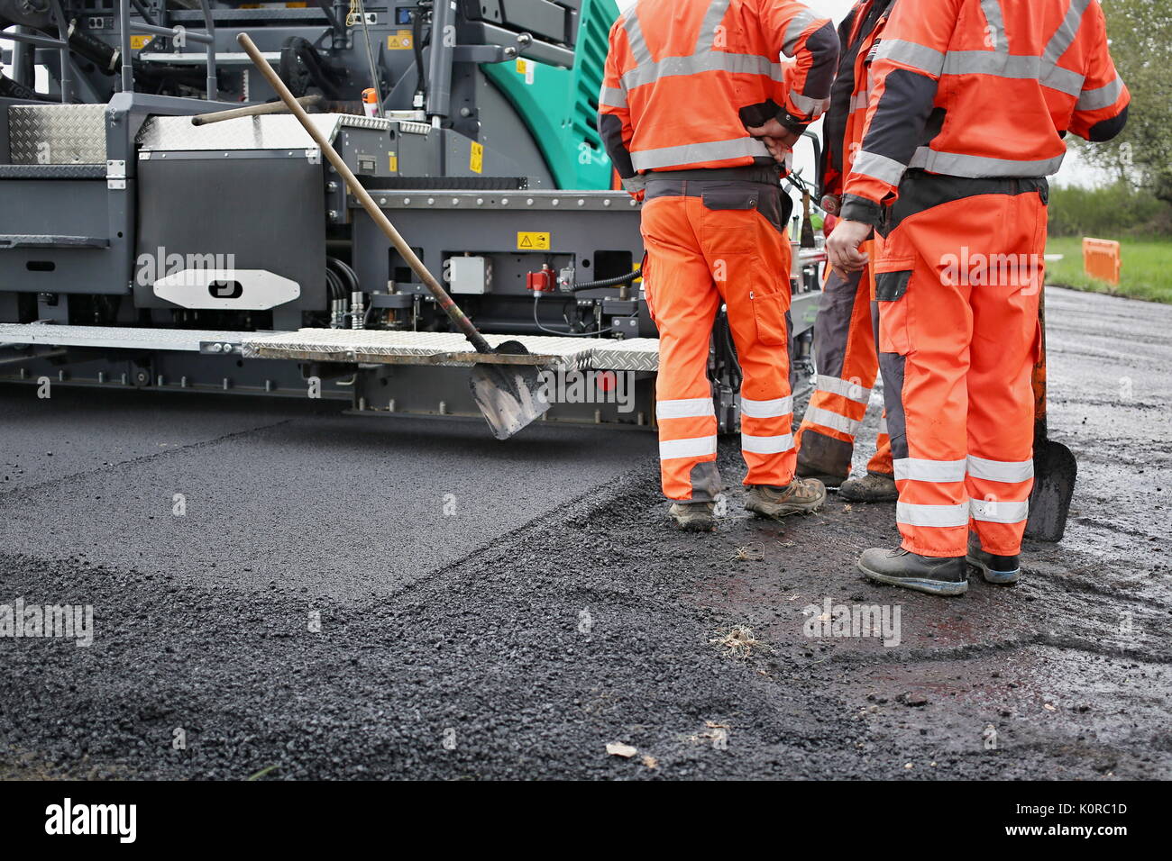Tractor, roller , truck on the road repair site. Road construction ...