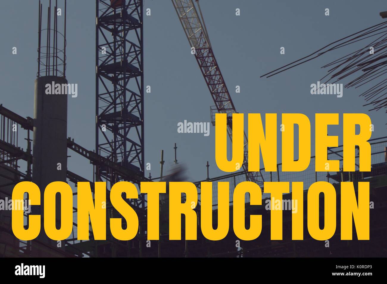 Digital composite of Under construction text against construction photo ...