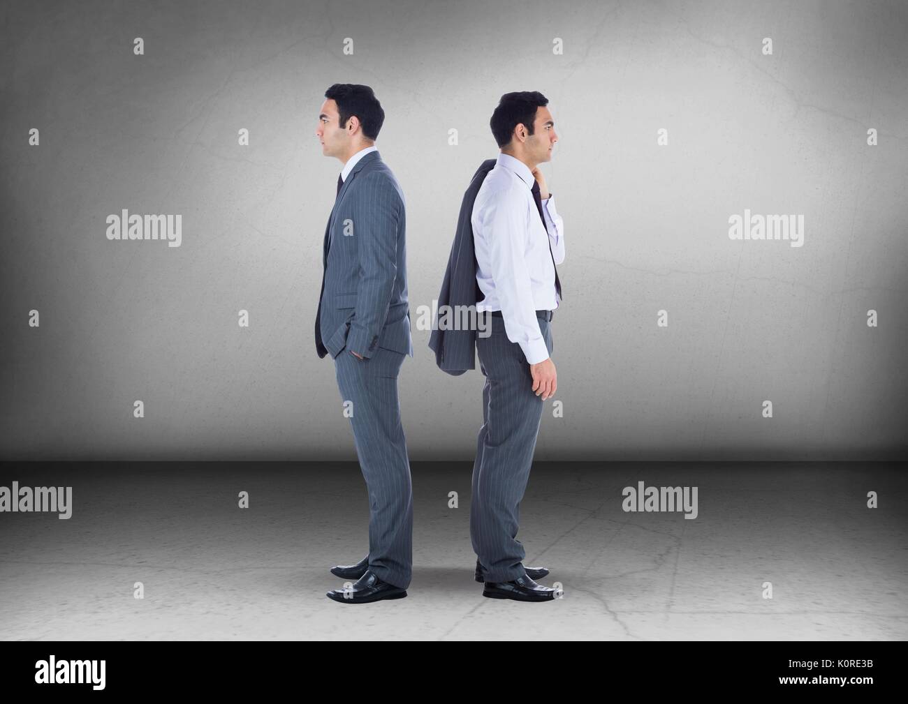 Digital composite of Businessman looking in opposite directions Stock ...