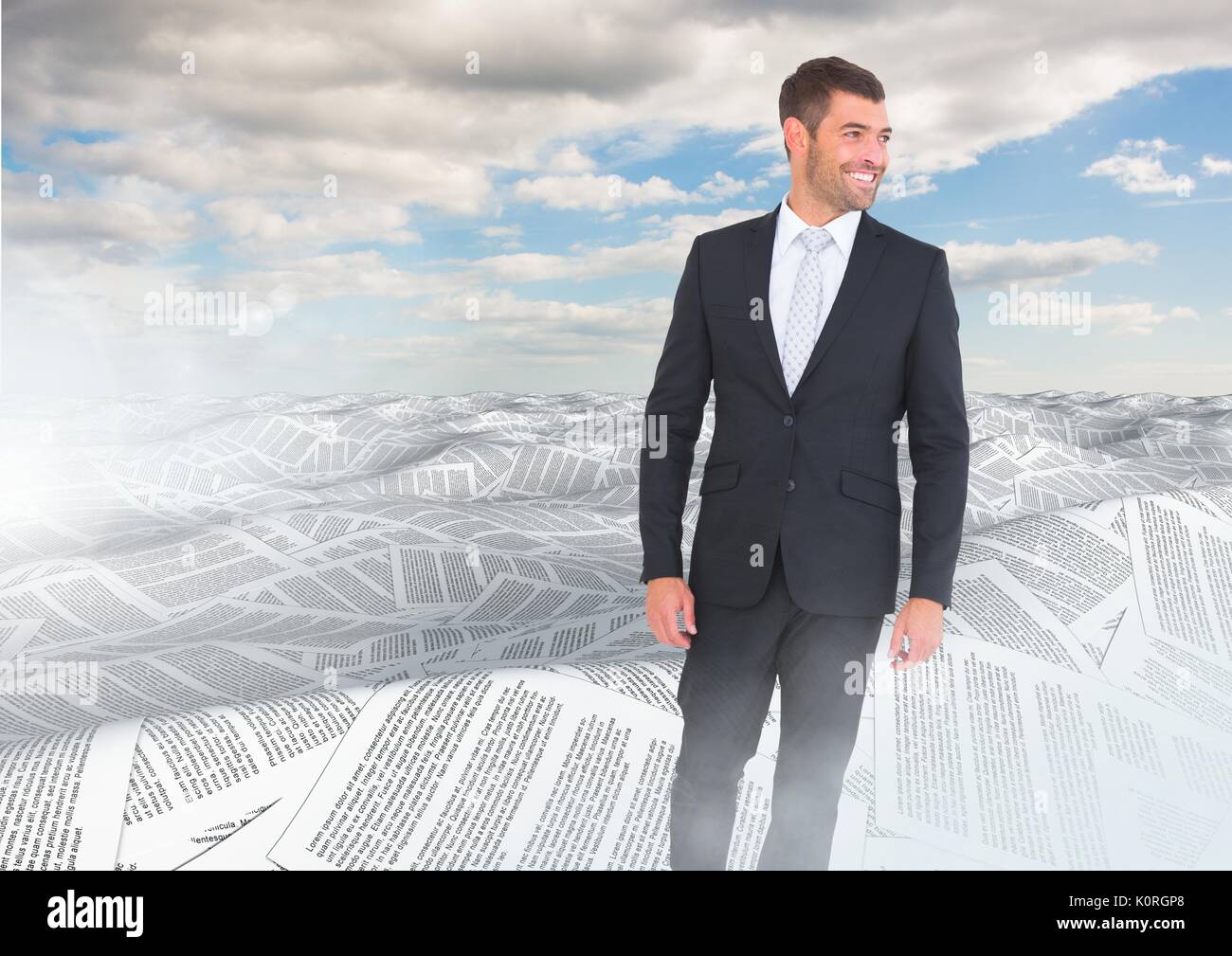 Digital composite of Businessman in sea of documents under sky clouds ...