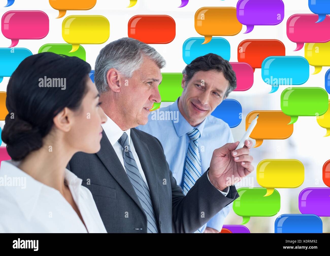 Digital composite of Business people on phone with shiny chat bubbles ...