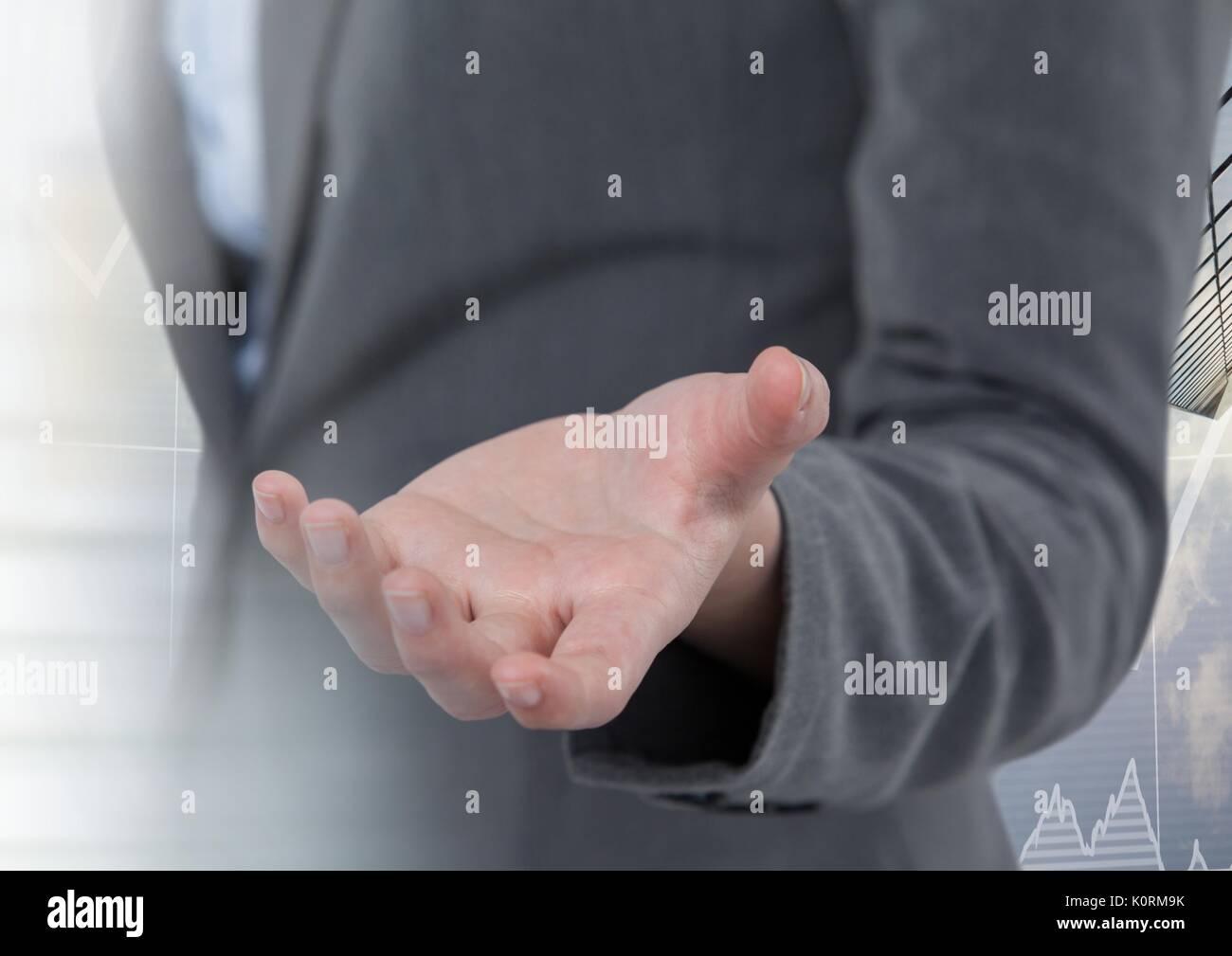 Digital composite of Hand holding and interacting with transition ...