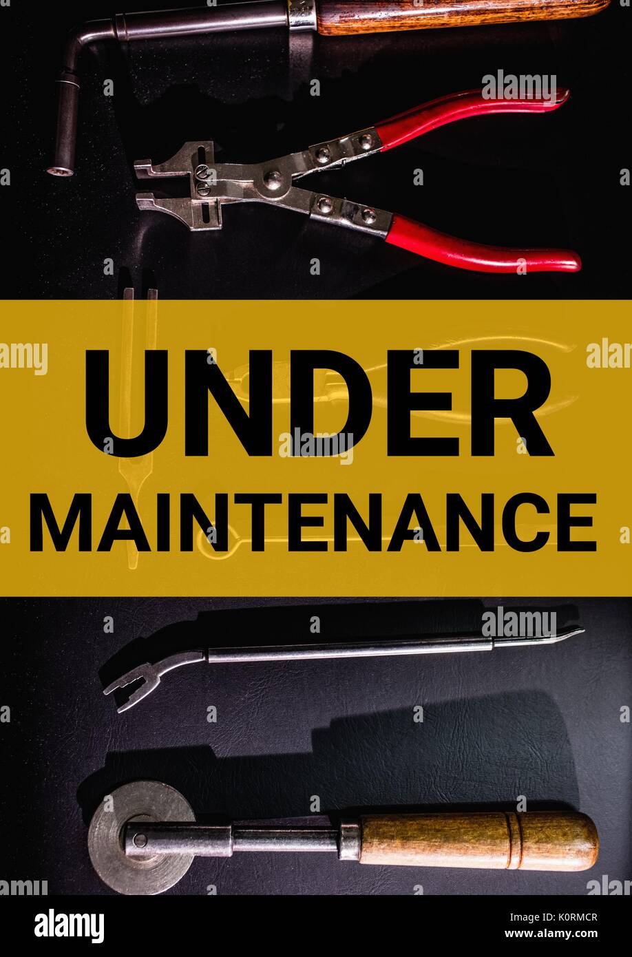 Digital composite of Under maintenance text against tools photo Stock ...