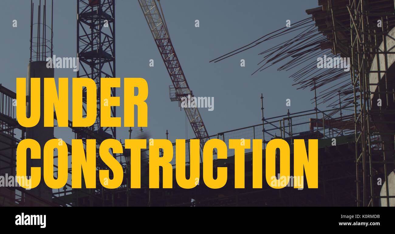 Digital composite of Under construction text against construction photo ...