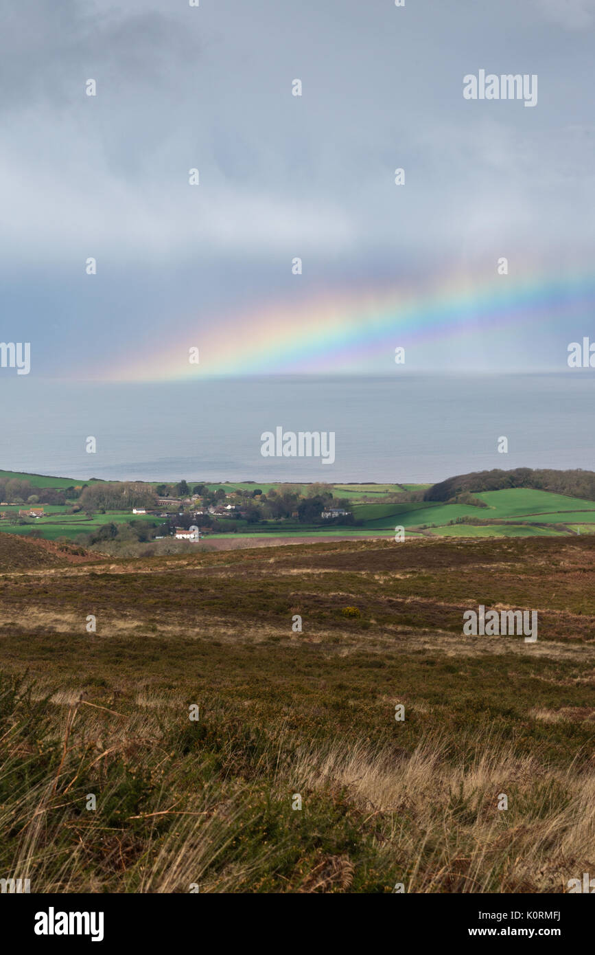 Storm clouds and a rainbow over the Bristol Channel. Picture taken from ...
