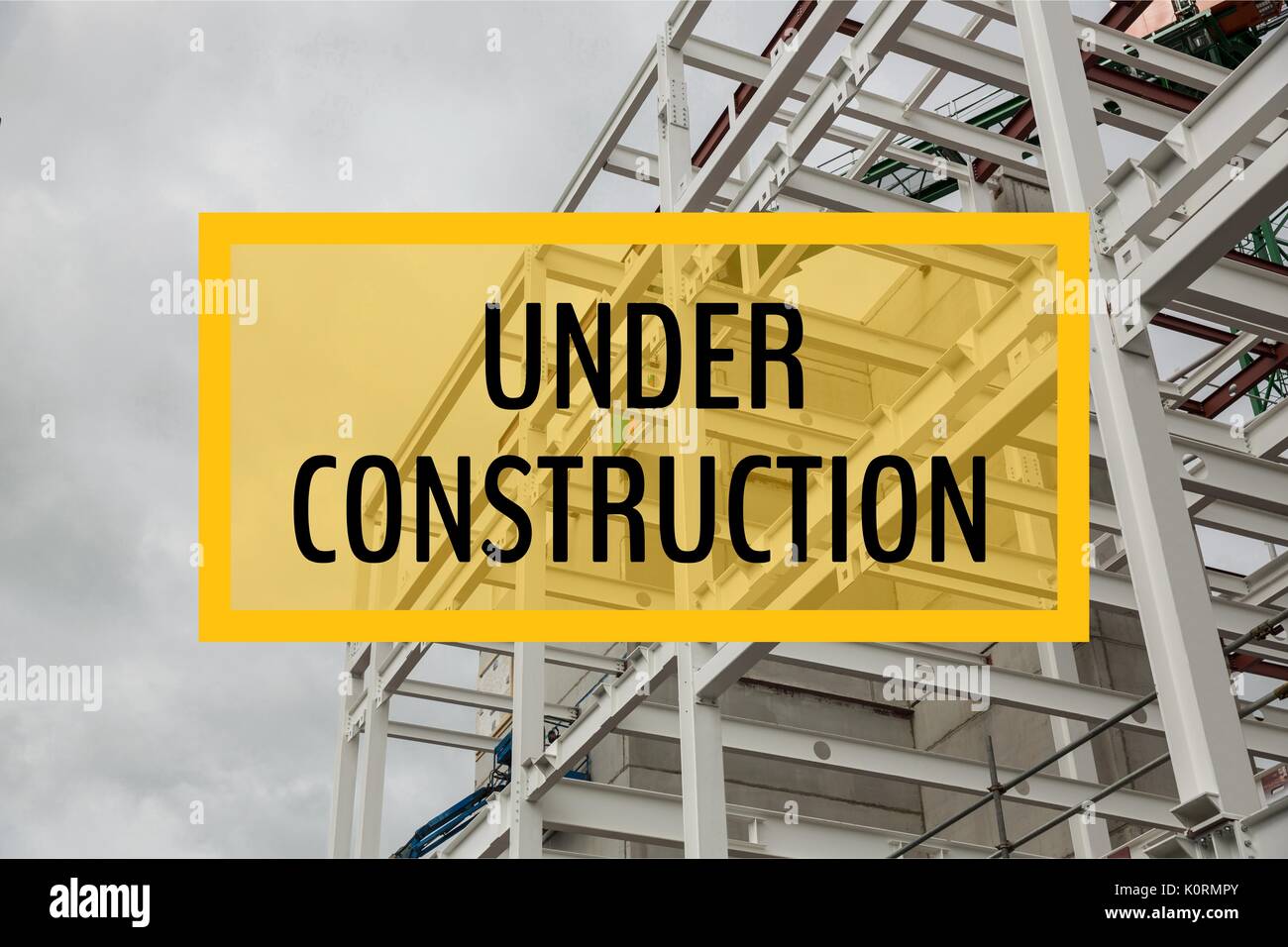 Digital composite of Under construction text against construction photo ...