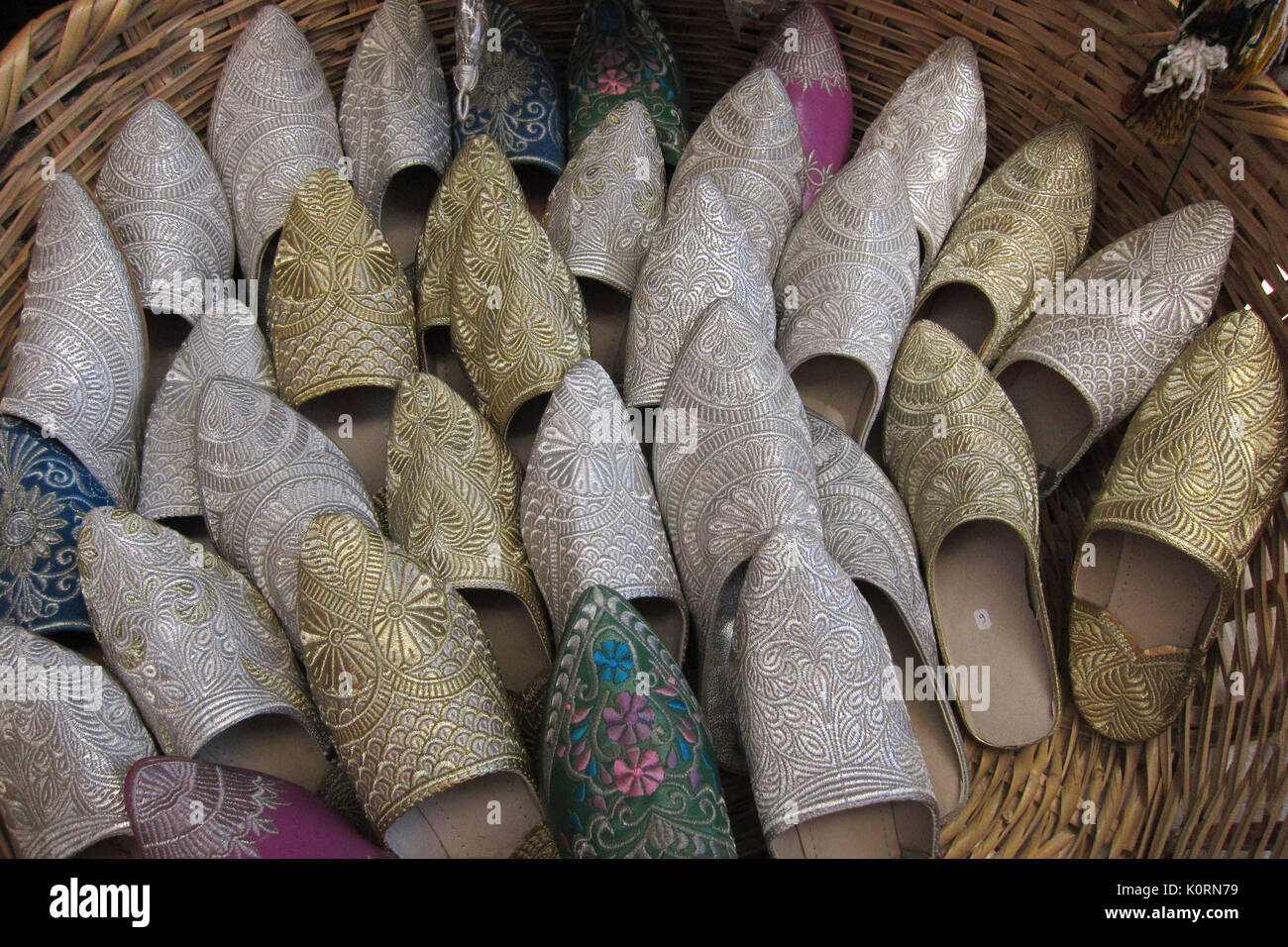 Moroccan shoes on display at a shop in the Medina of Fes, Morocco Stock ...