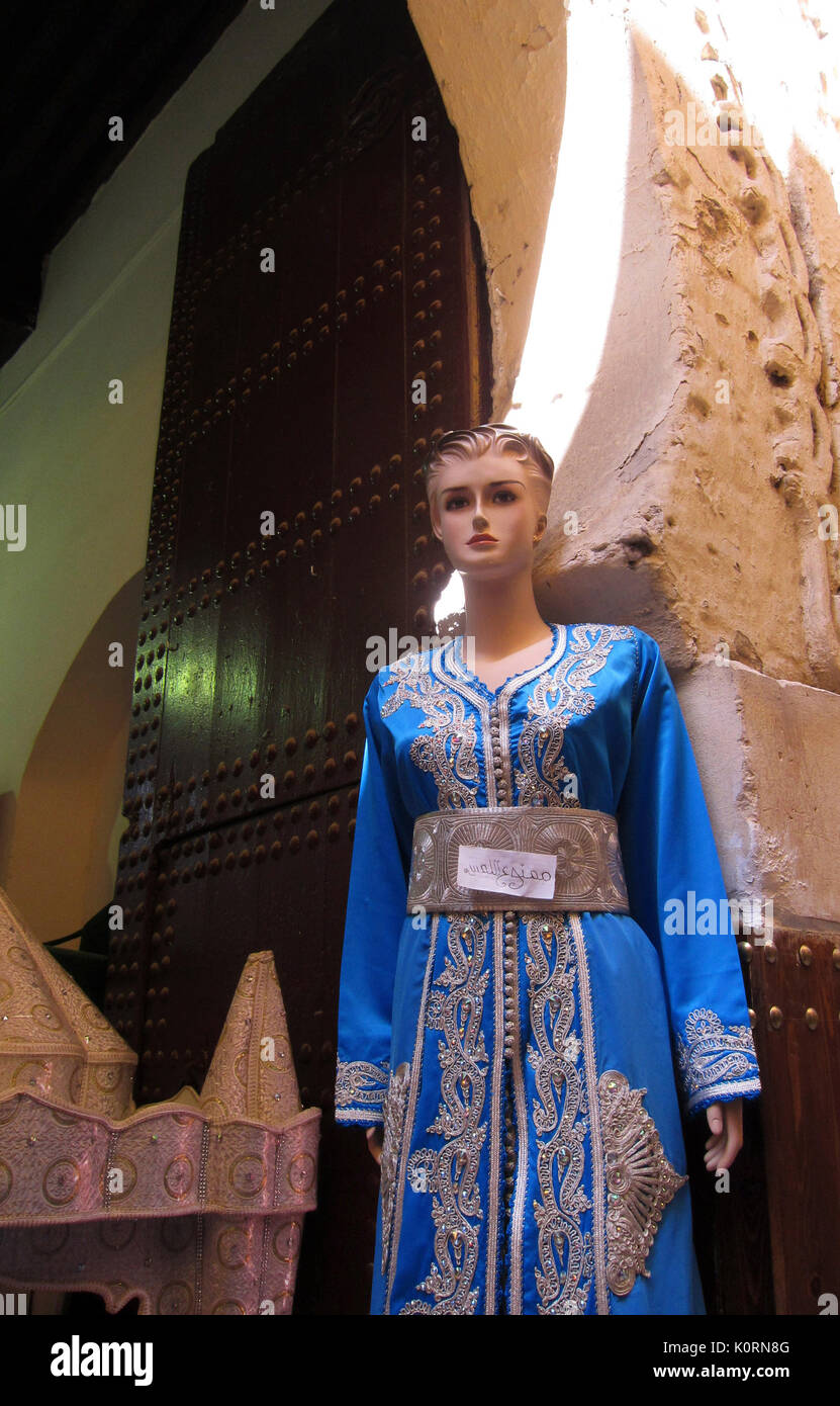 Moroccan lady's dress on display in a shop of the Medina of Fes ...