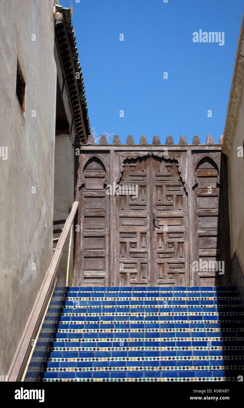 Tiled steps and wooden door leading to the Karaouiyine Library, Fes ...