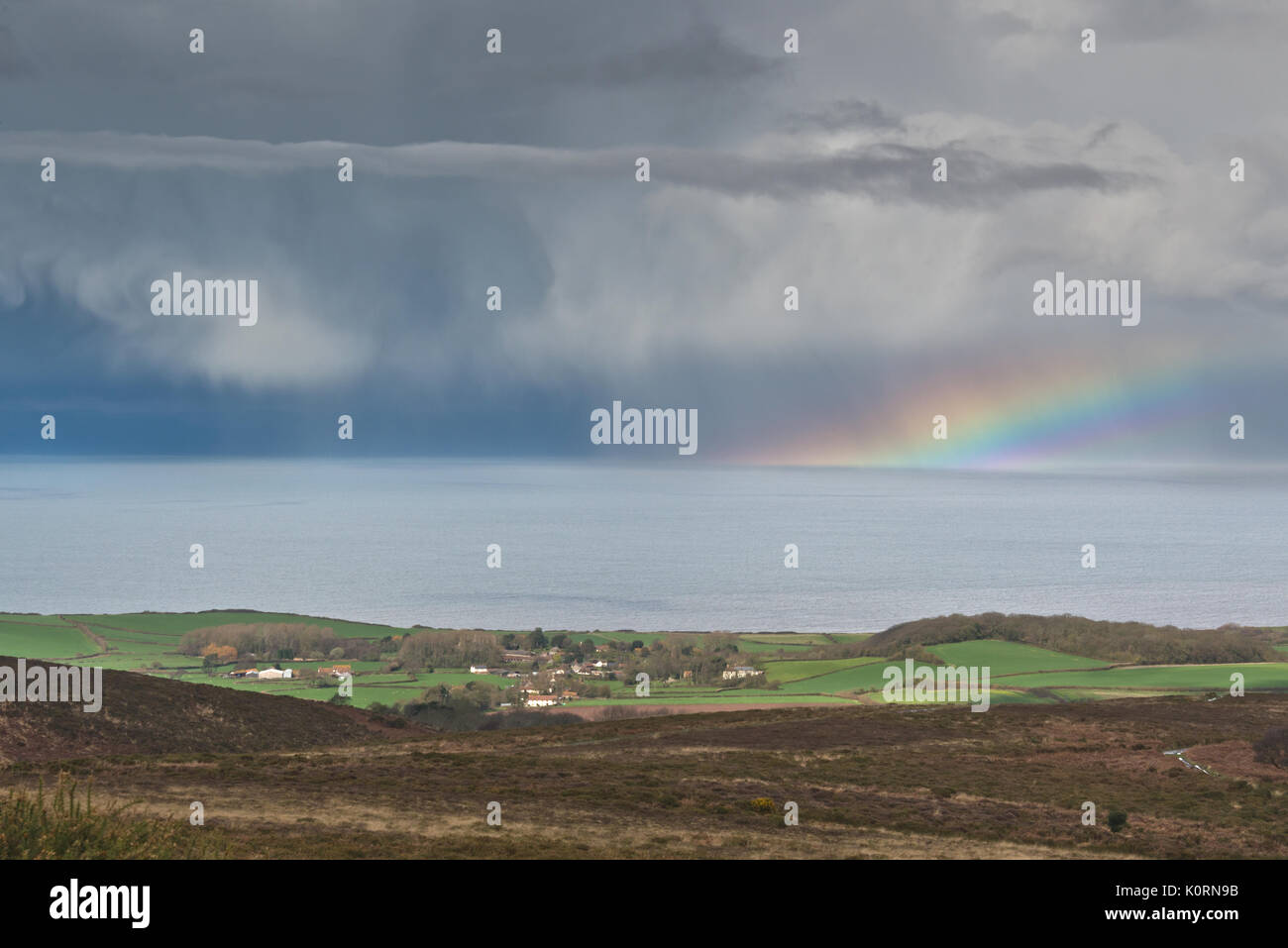 Storm clouds and a rainbow over the Bristol Channel. Picture taken from ...