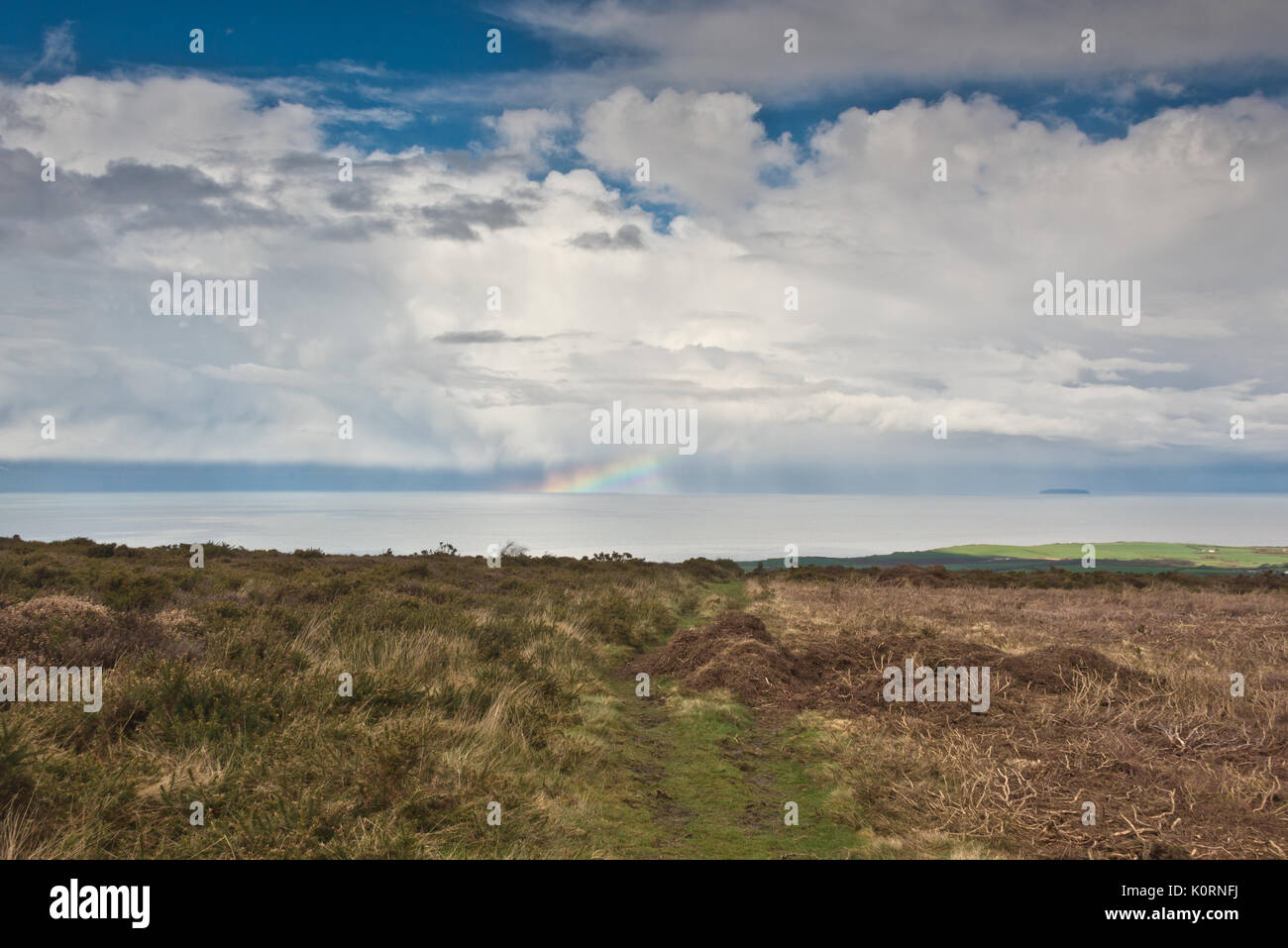 Storm clouds and a rainbow over the Bristol Channel. Picture taken from ...