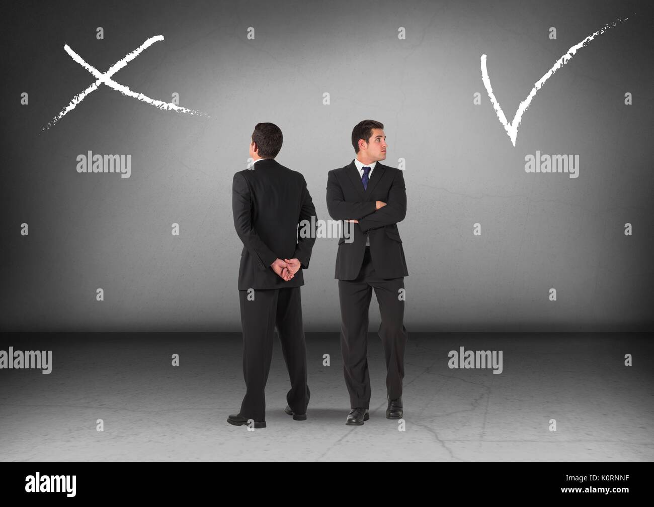 Digital composite of Correct Right or wrong drawings with Businessman ...