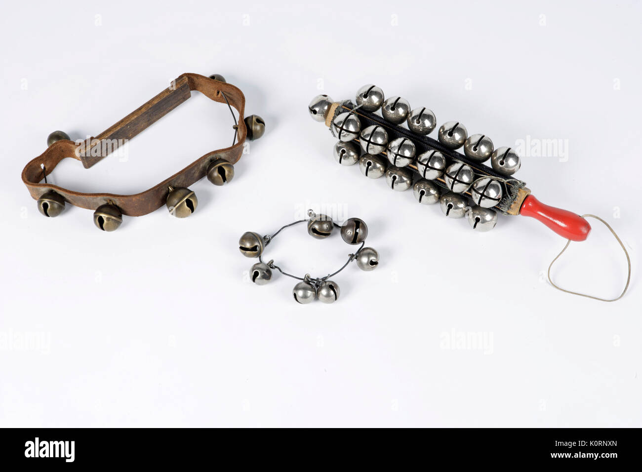 Sleigh bells - three varieties, one on a strap, one on a wire, and one ...