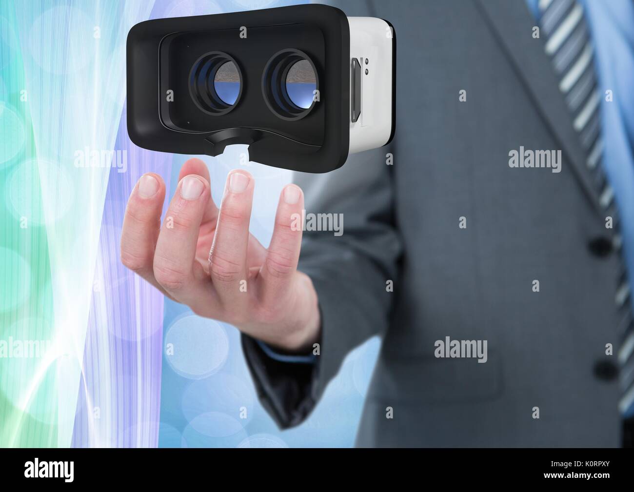 Digital composite of Hand holding and interacting with virtual reality ...