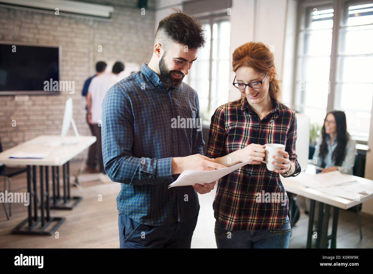 Group young designers in hi-res stock photography and images - Alamy