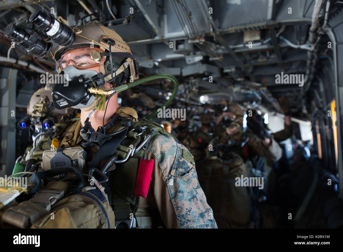 A Force Reconnaissance team waits to perform high altitude-high opening ...