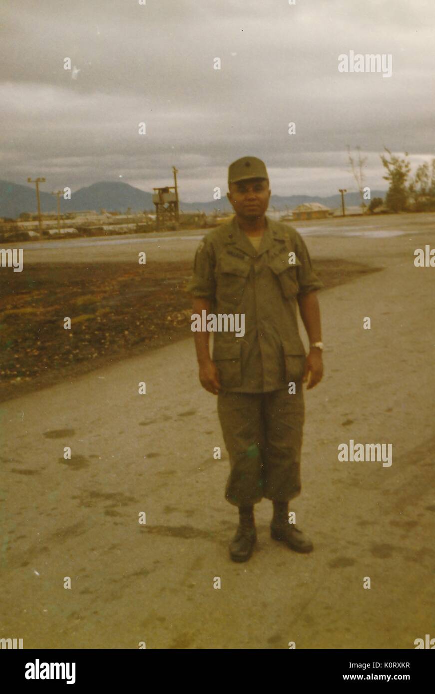 A full length portrait of Army Lieutenant AL Walker, posing for a photo ...