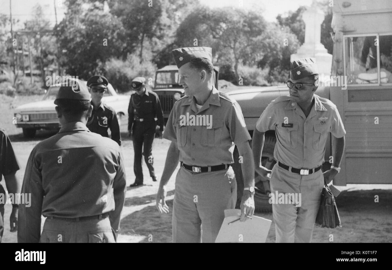 Lieutenant AL Walker walking next to another high ranking Army official ...