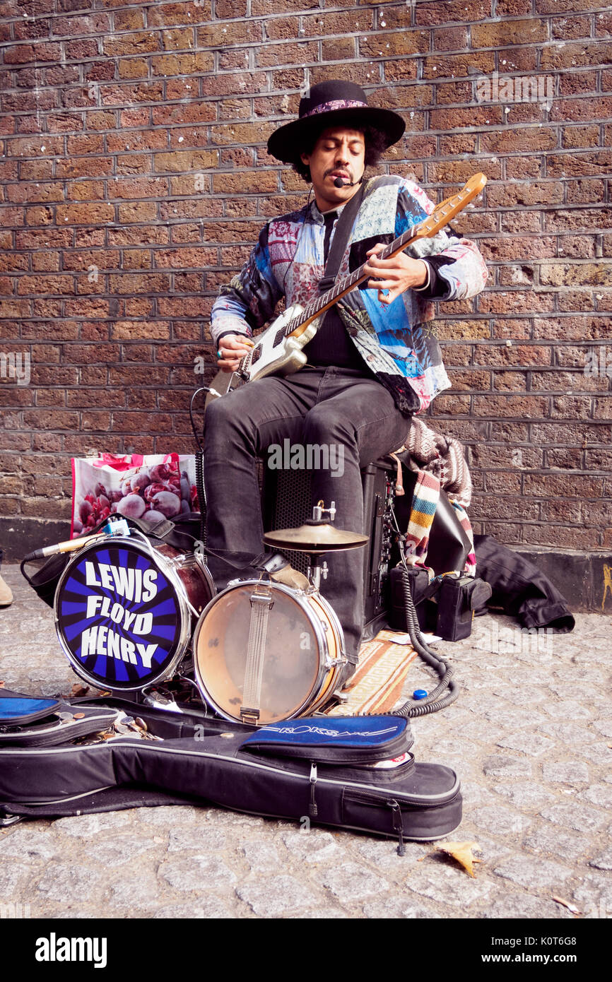 Street musician in Brick Lane. London, 2016. Portrait format Stock ...