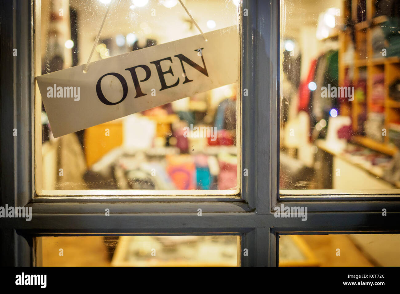 Open signboard on shop door. Landscape format Stock Photo - Alamy