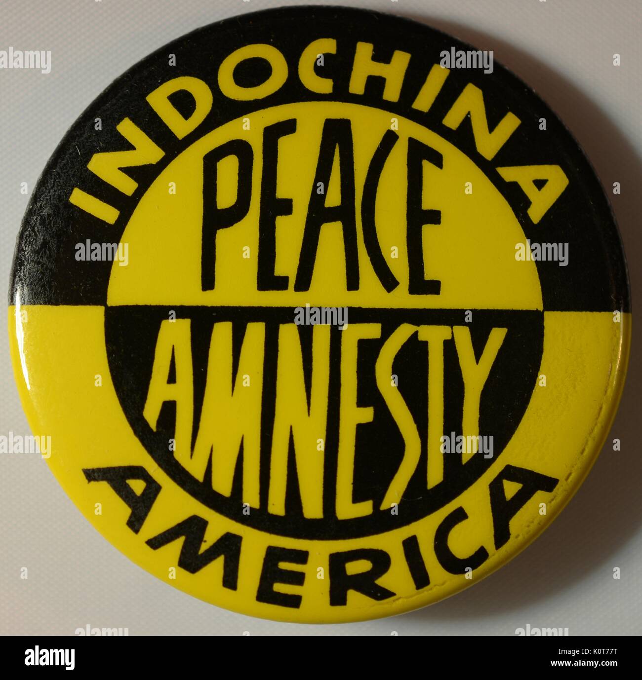 An anti-Vietnam War draft pin, it contains the words Indochina, America ...