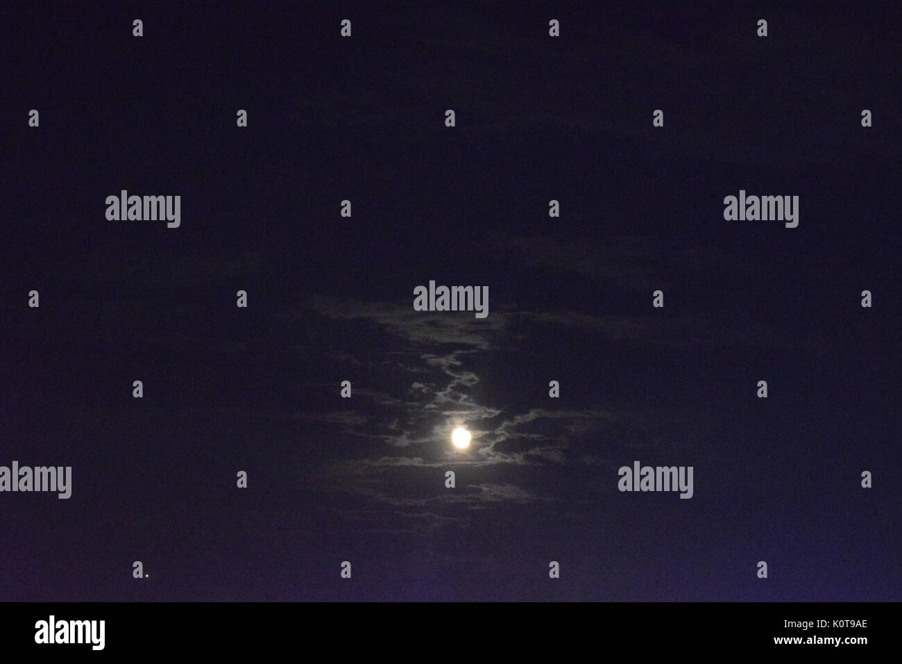 Moon in Sky with Clouds Stock Photo - Alamy