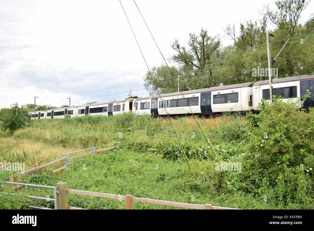 Central line train at outdoor station in london hi-res stock ...