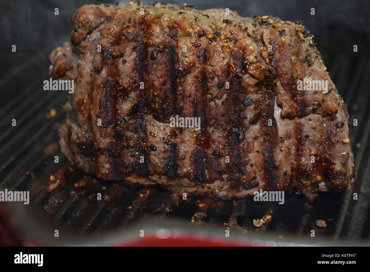 Close up of rump steak cooking in a grill Stock Photo - Alamy