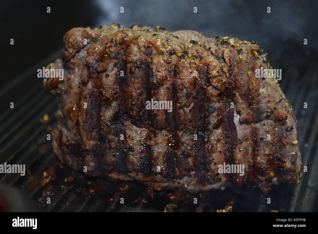 Rump steak cooking in a grill Stock Photo - Alamy