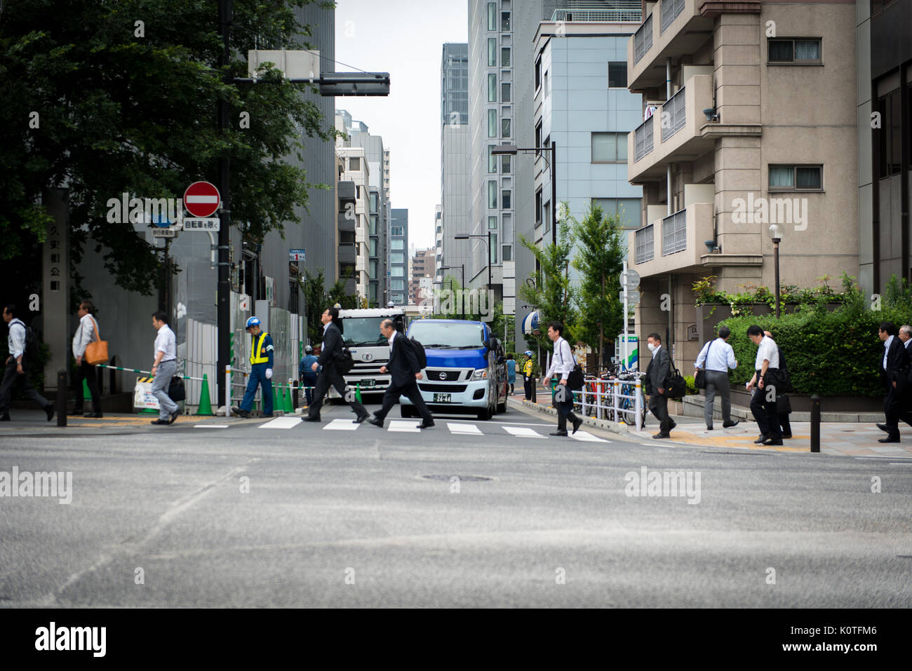 Business commuter walking to work in straight line Stock Photo - Alamy