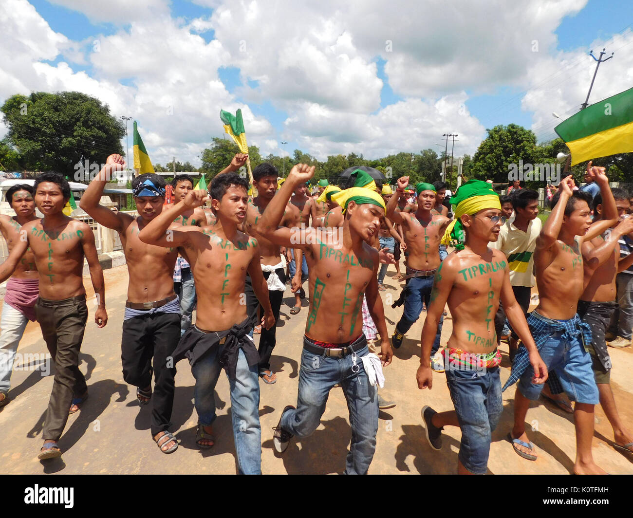 The IPFT (Indigenous People's Front of Tripura) supporter are walking ...