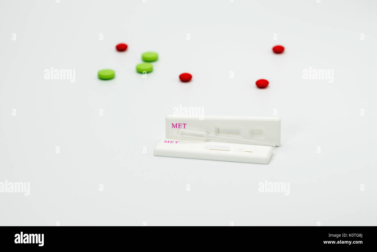 Two methamphetamine cassette test and plastic dropper with red and ...