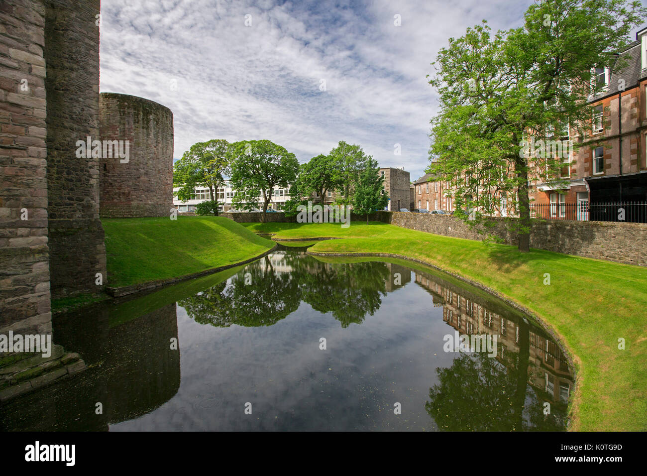 View, from historic castle, of town of Rothesay with buildings & castle ...