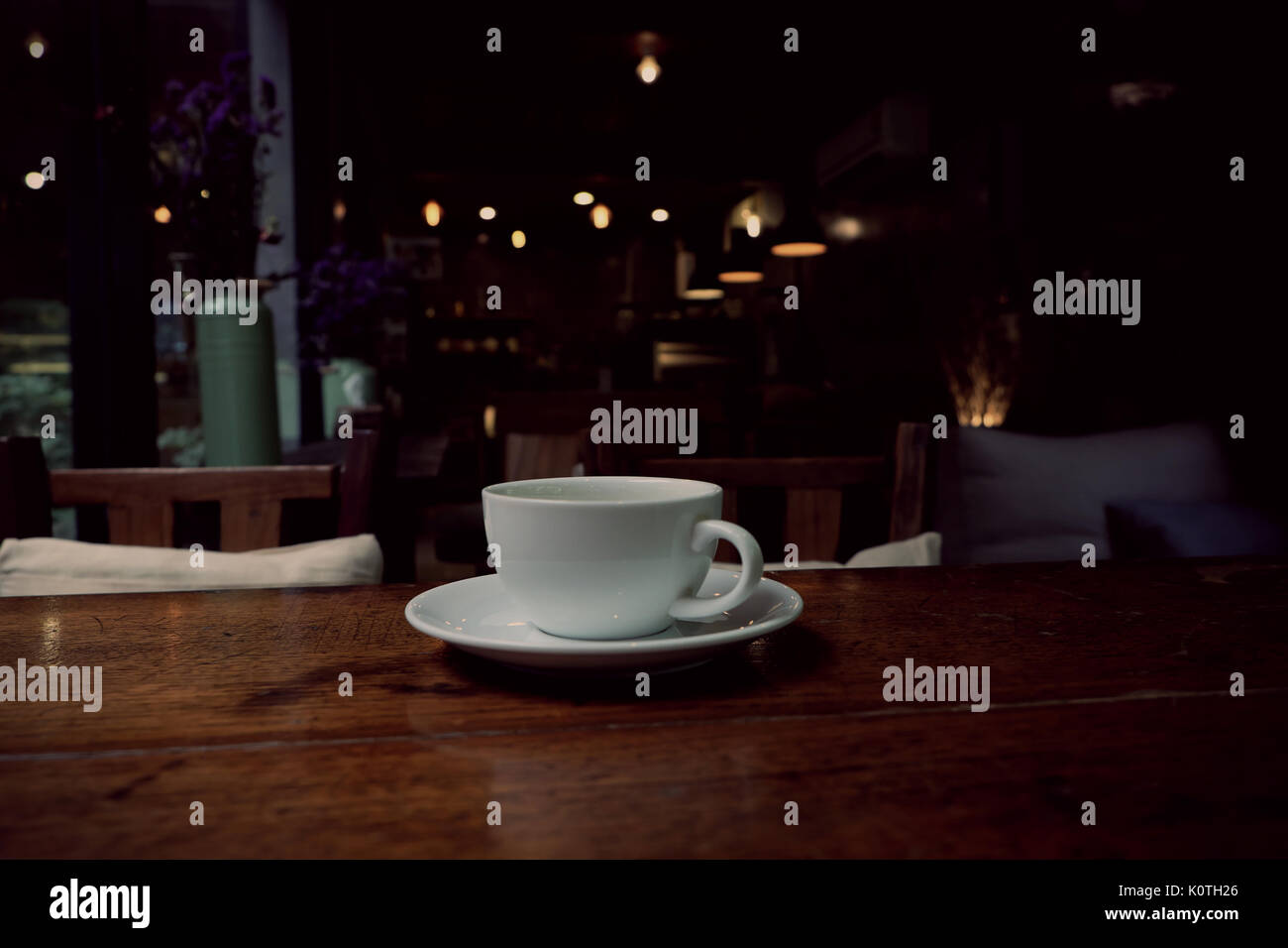 Coffee cup in coffee on table in cafe Stock Photo - Alamy