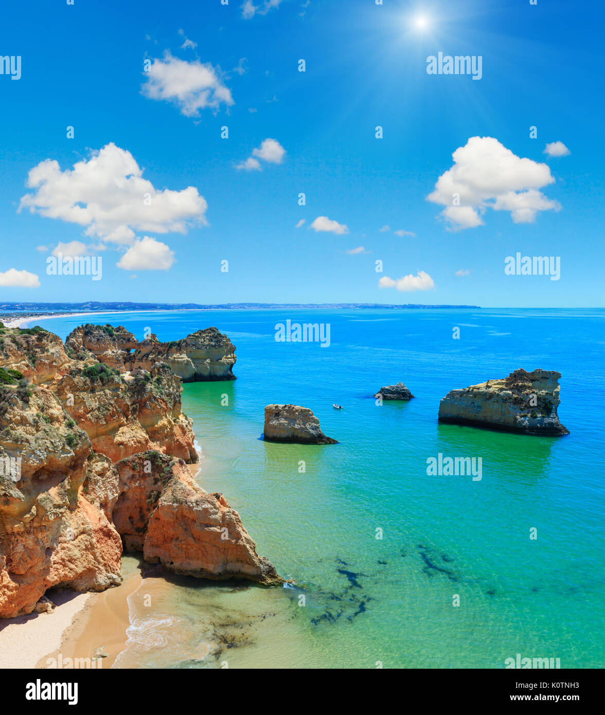 Rocks near beach Dos Tres Irmaos. Top view with blue sunshiny sky ...