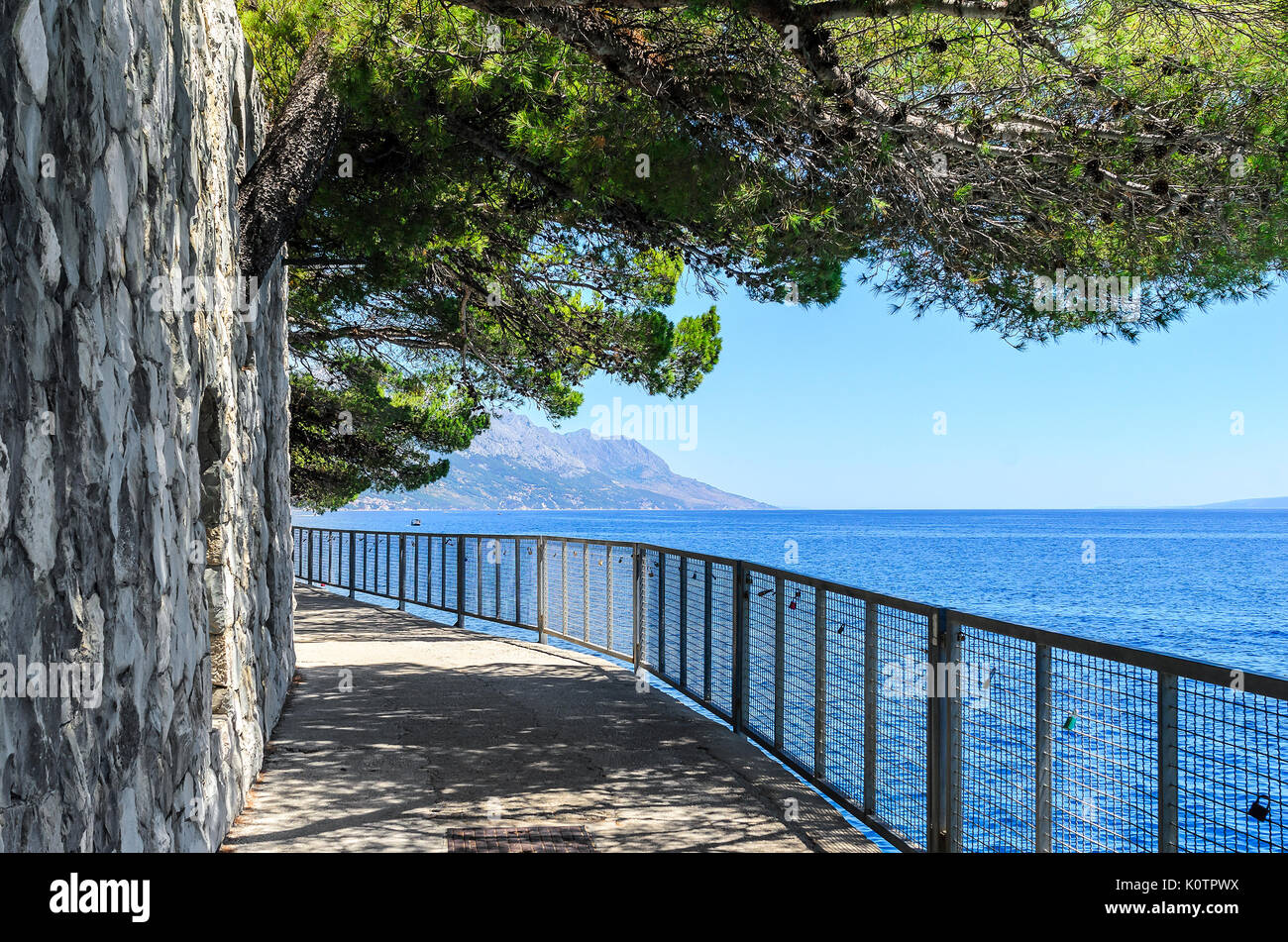 Concrete path by the sea Stock Photo - Alamy