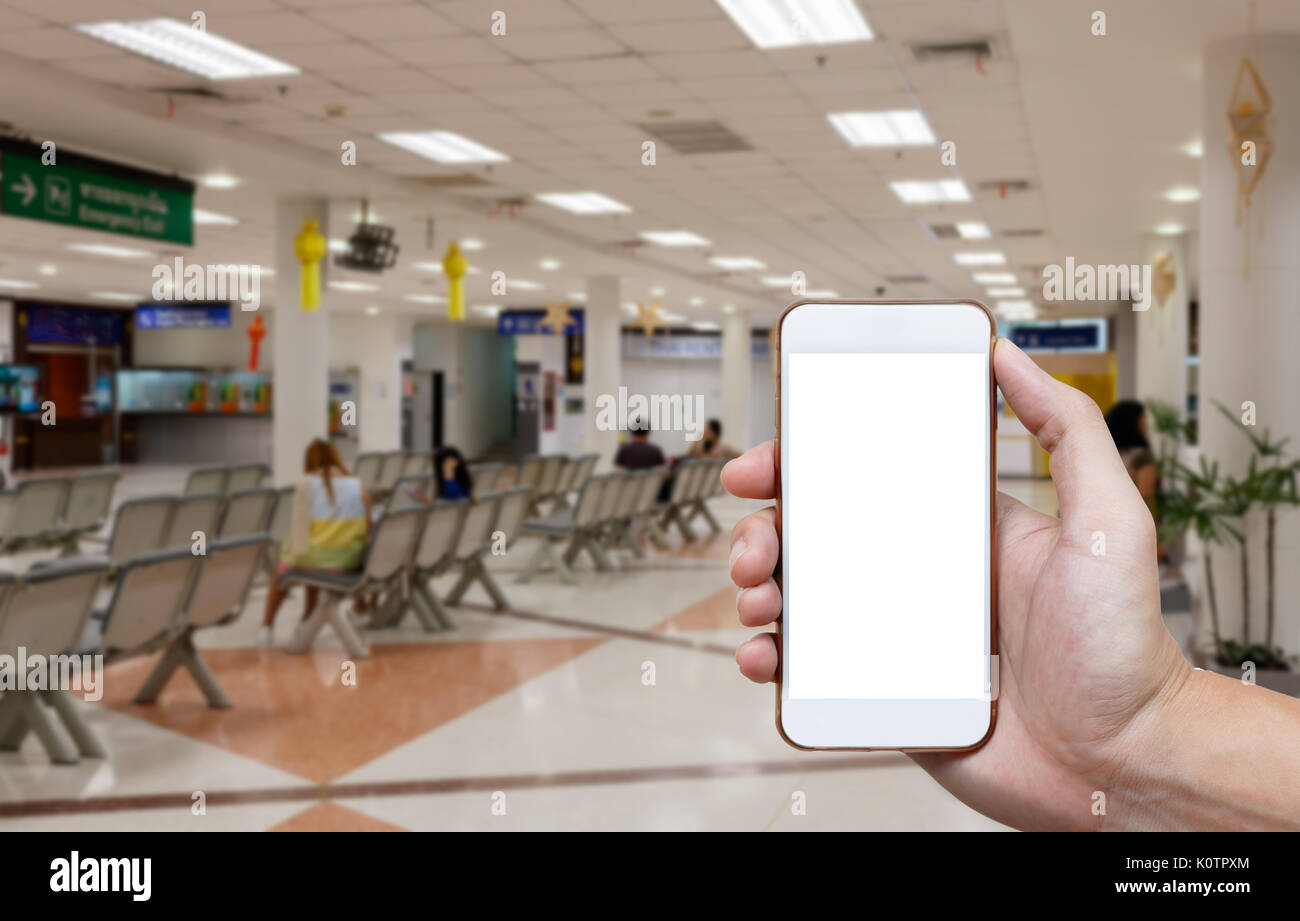 Human holding blank screen of smart phone and waiting arrivals time ...