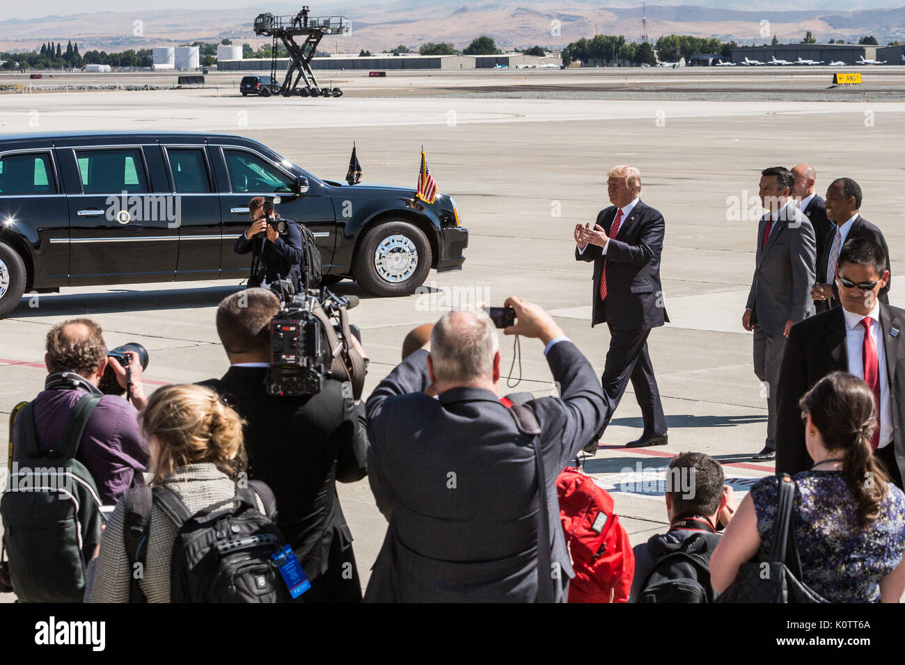 Reno, Nevada, USA. 23rd Aug, 2017. PRESIDENT DONALD J. TRUMP claps his ...