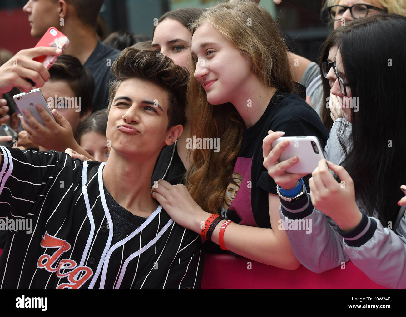 Cologne, Germany. 24th Aug, 2017. Singer Lukas Rieger (L) taking ...