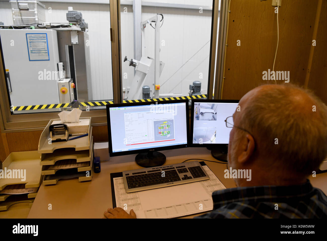 A free-standing system for material, which reaches the outside of the ...