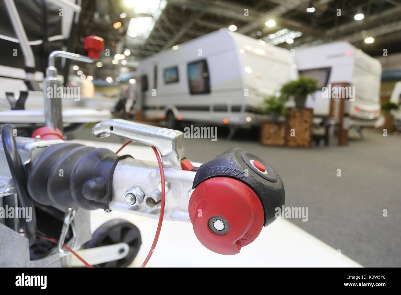 A trailer coupling can be seen in front of several caravans during the ...