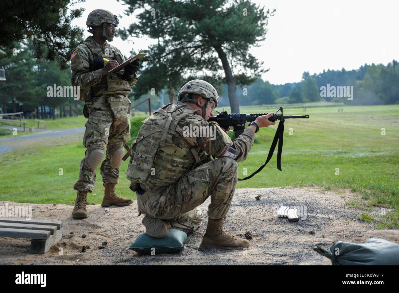 U.S. Army 1st Lt. Maclean Lalor with 173rd Airborne Brigade fires his ...