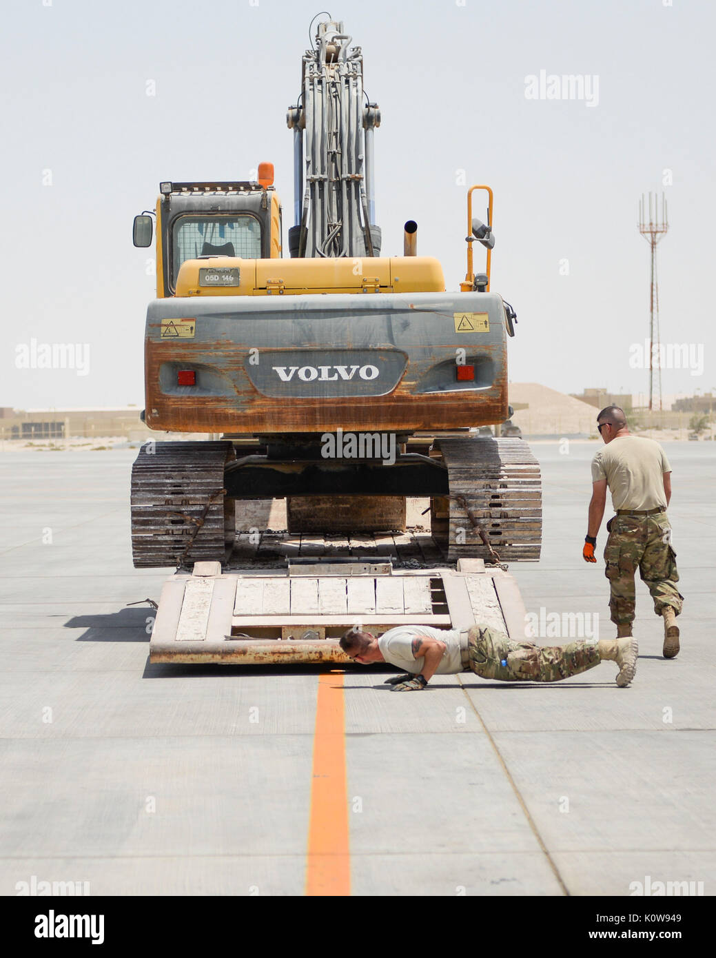 U.S. Air Force Staff Sgt. David Wakeman, laying down, airfield operator ...